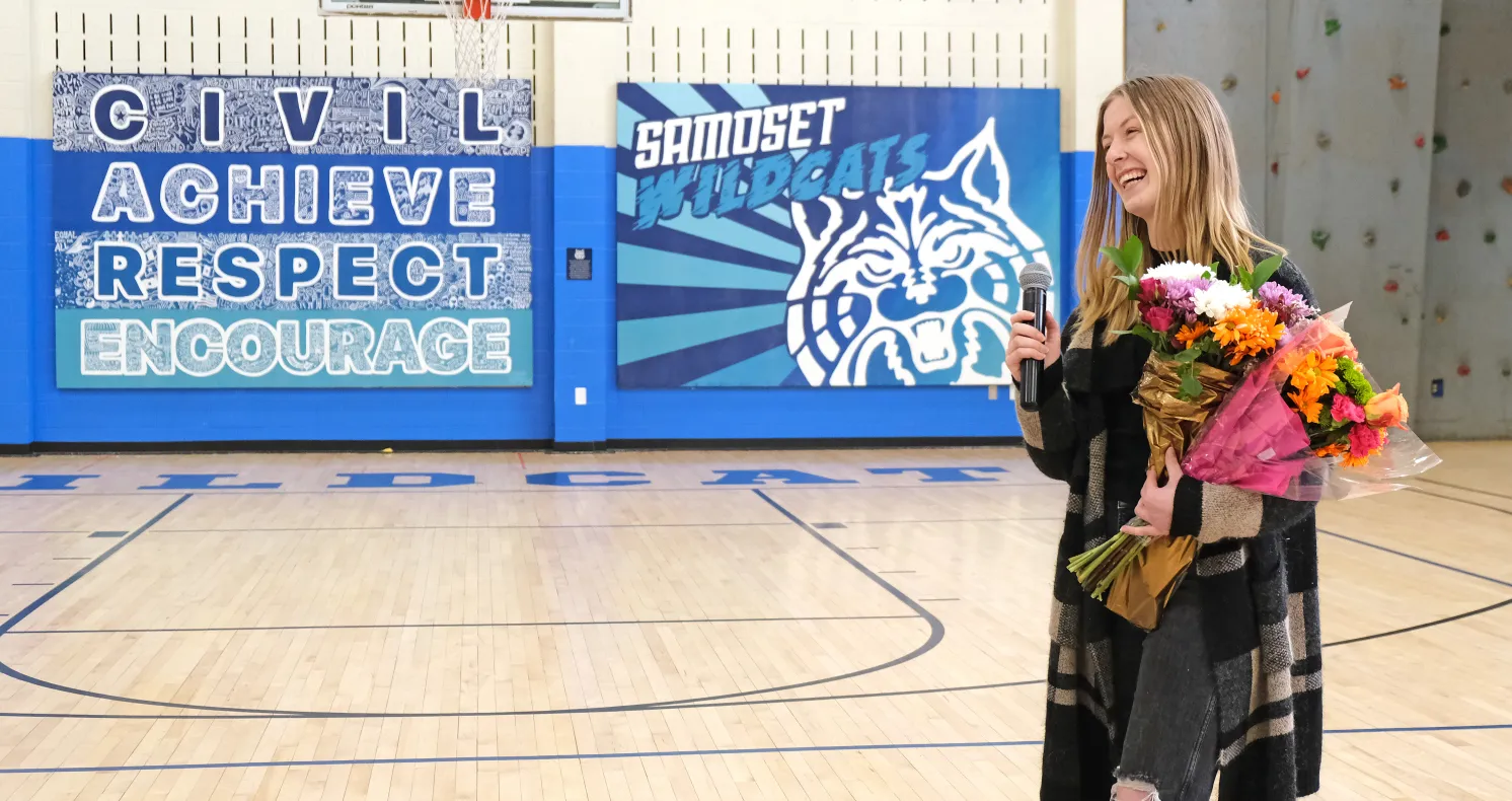 Devin Tormey and murals | Fitchburg State University